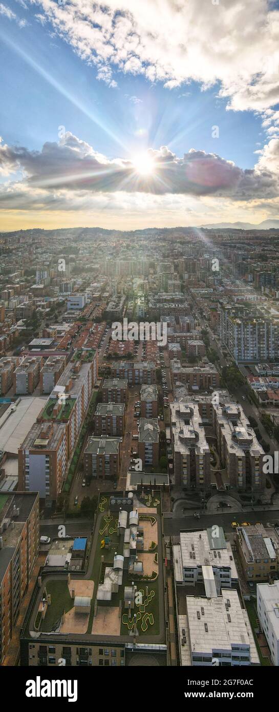 Vertical shot of cityscape on a sunny, cloudy day Stock Photo - Alamy