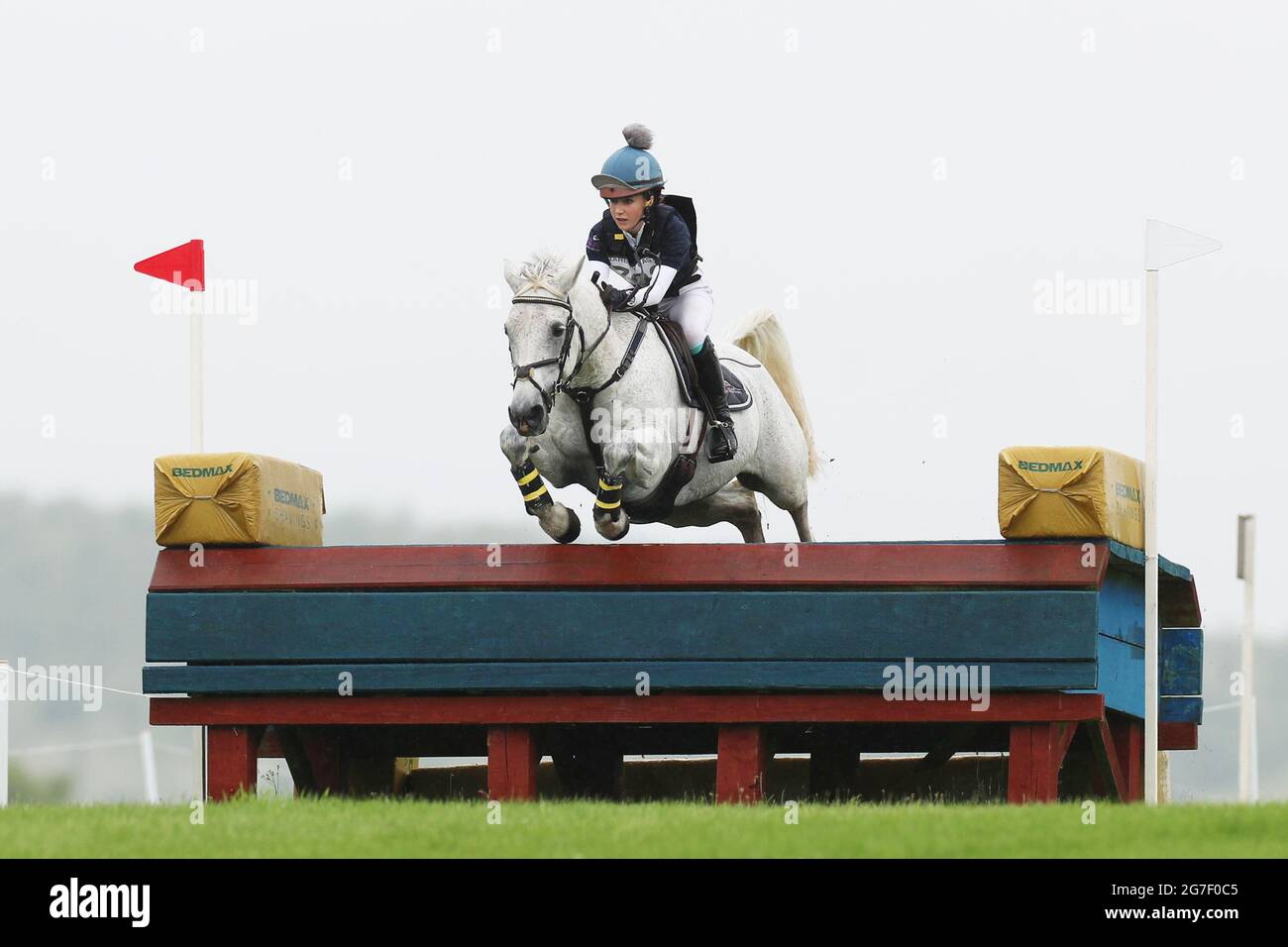 MARLBOROUGH, UK. JULY 11TH. Elizabeth Barratt riding Uptons Deli Carousel during the PT Section ...