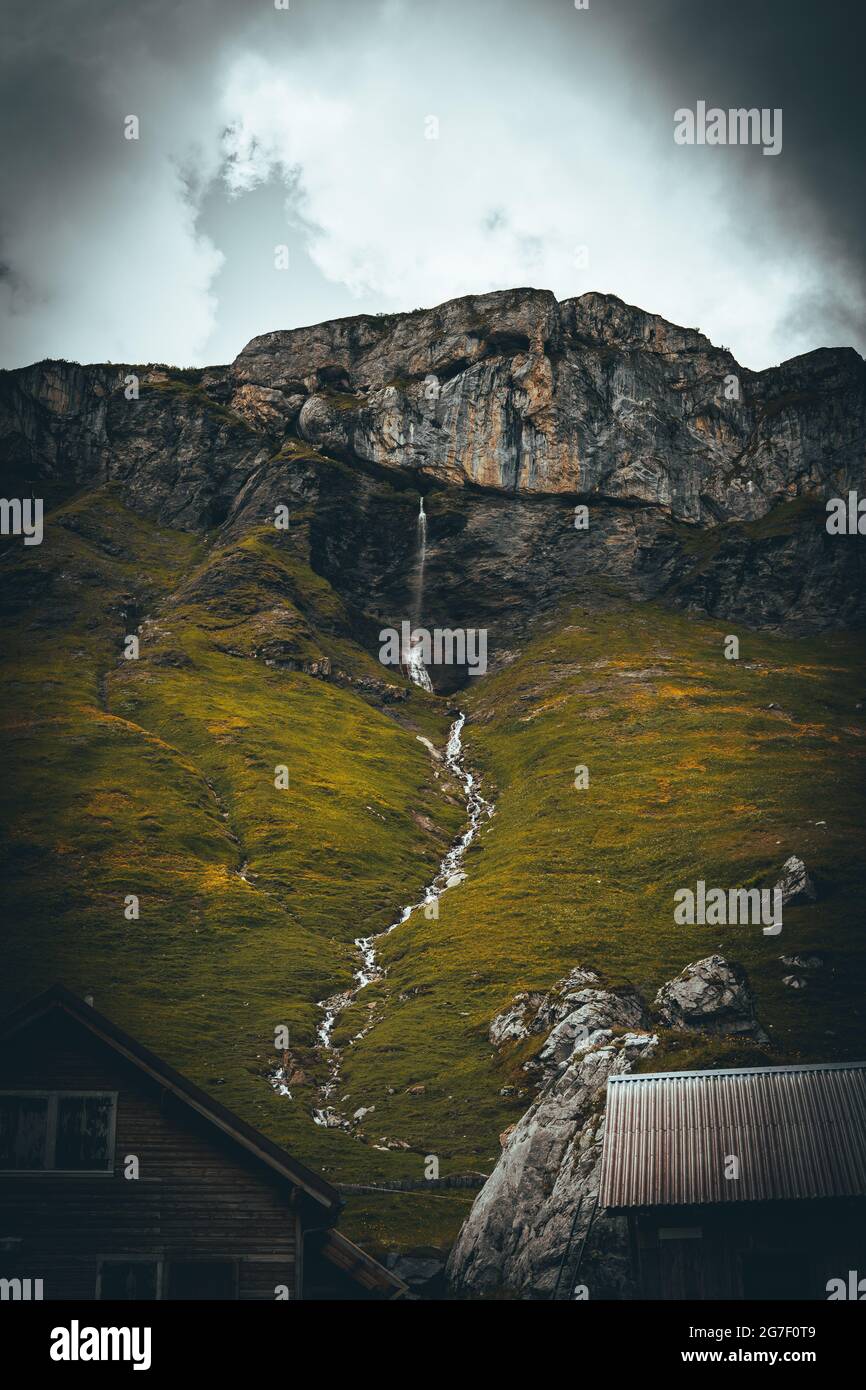 Vertical shot of a shallow waterfall in a rural area Stock Photo - Alamy