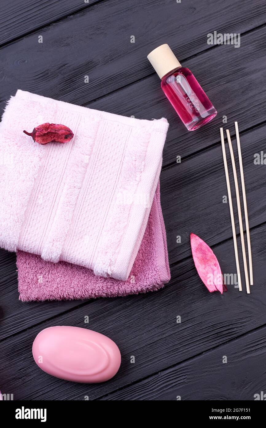 Body care spa stuff on dark wooden desk Stock Photo - Alamy