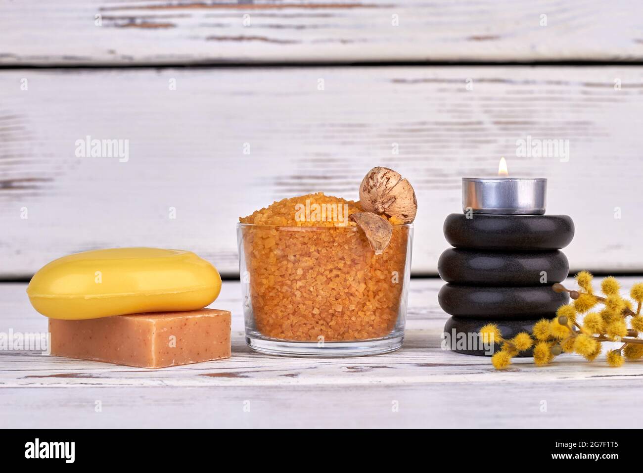 Glass of yellow salt with soap pieces and stack of stones Stock Photo ...