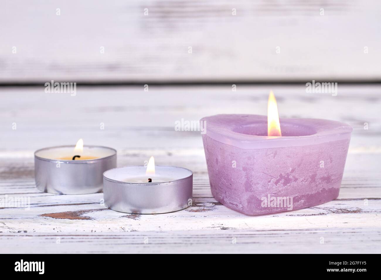 Burning wax candles hi-res stock photography and images - Alamy