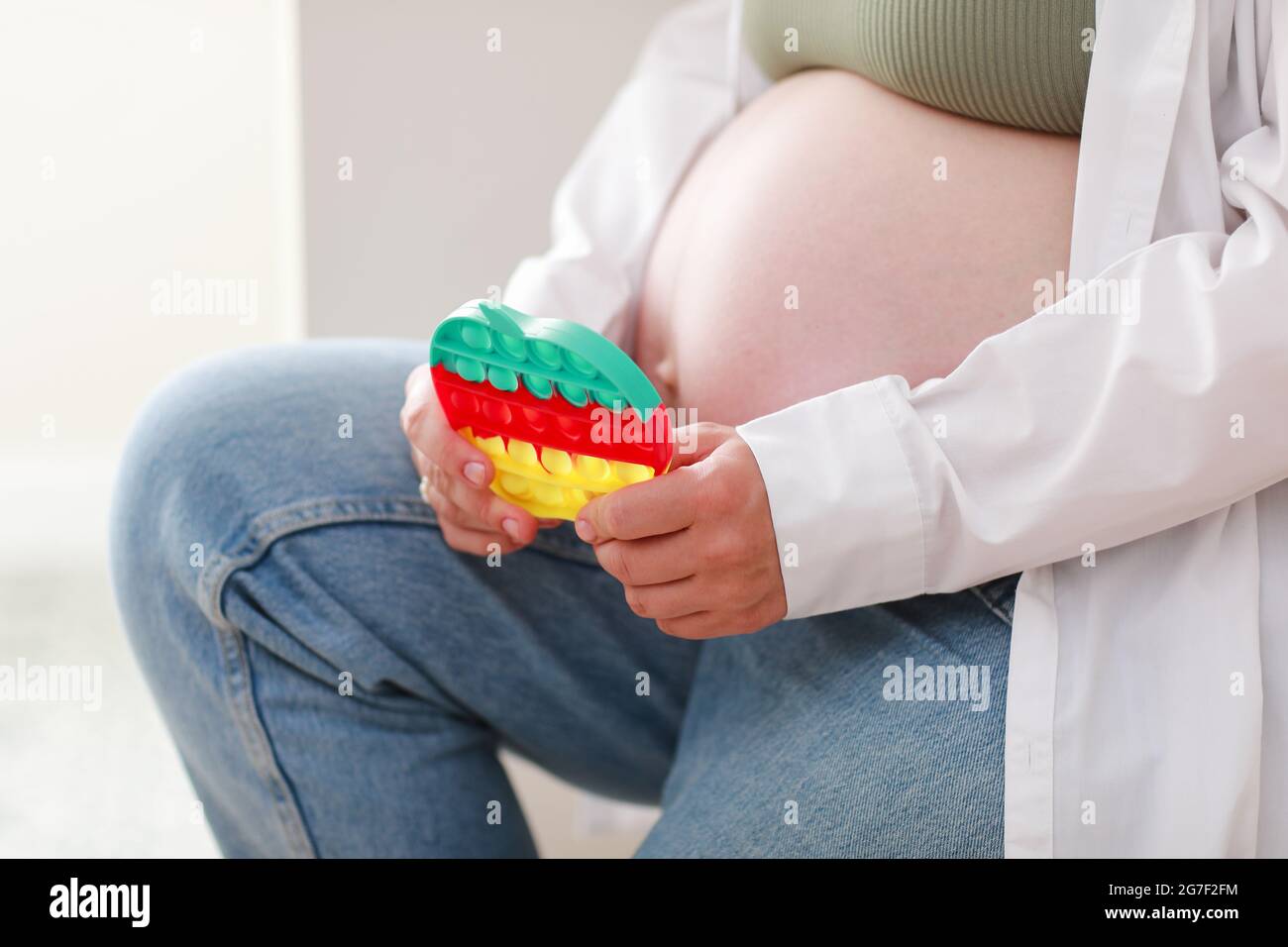 pregnant woman with big belly advanced pregnancy is using anti stress ...