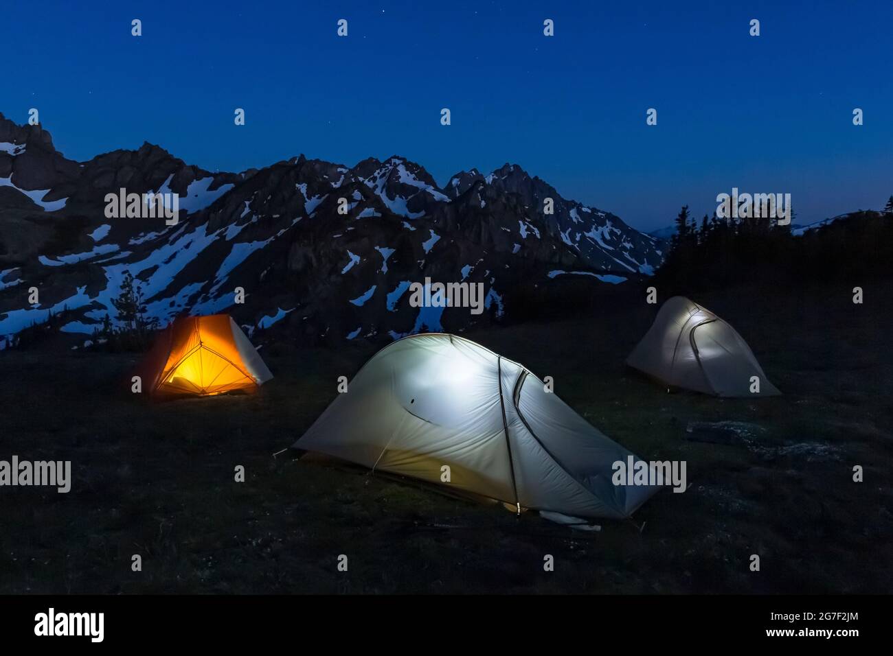 Illuminated backpacking tents at Marmot Pass in the Buckhorn Wilderness ...