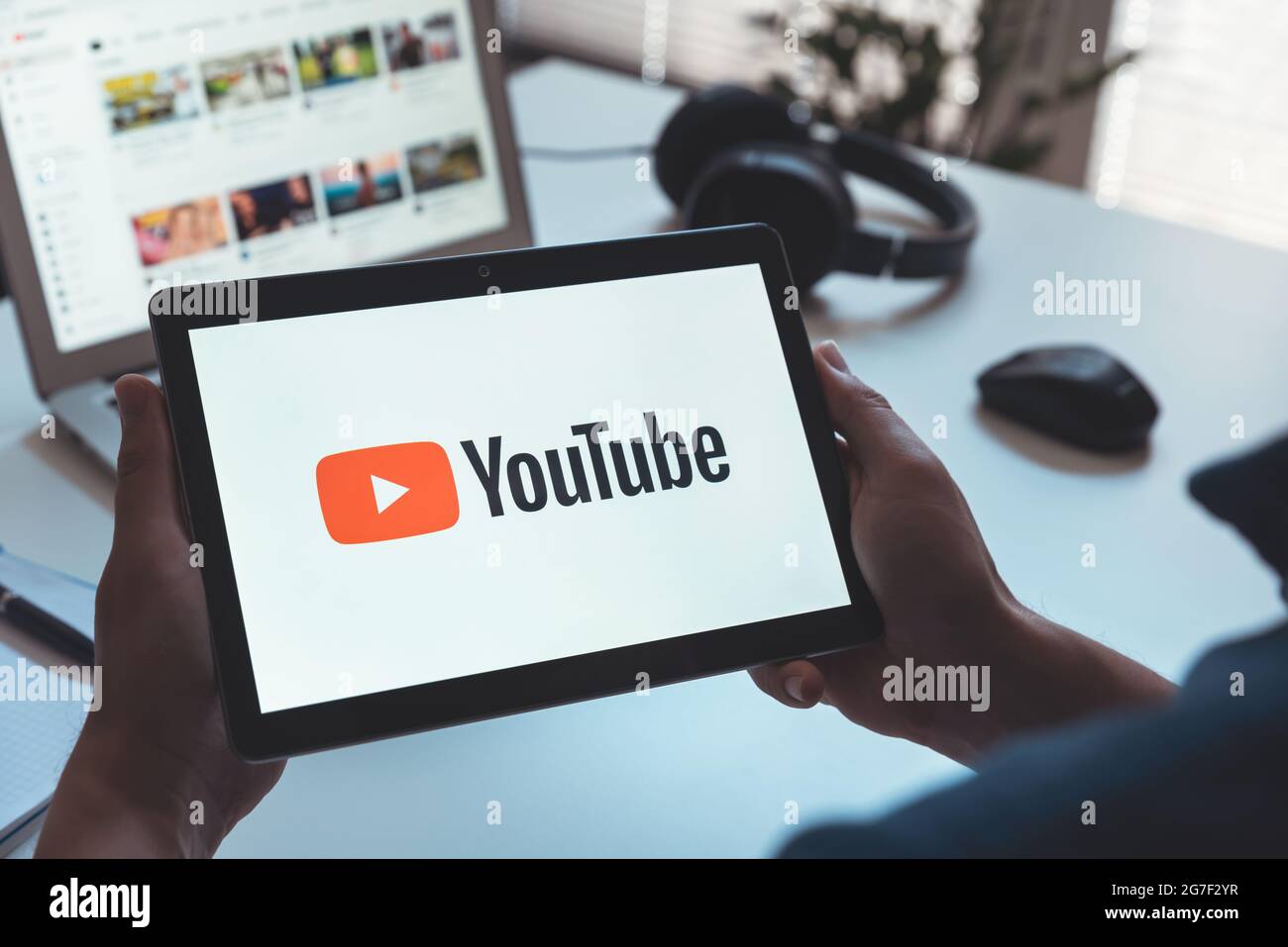 Wroclaw, Poland - JUN 17, 2021: Man holding device with YouTube logo on ...
