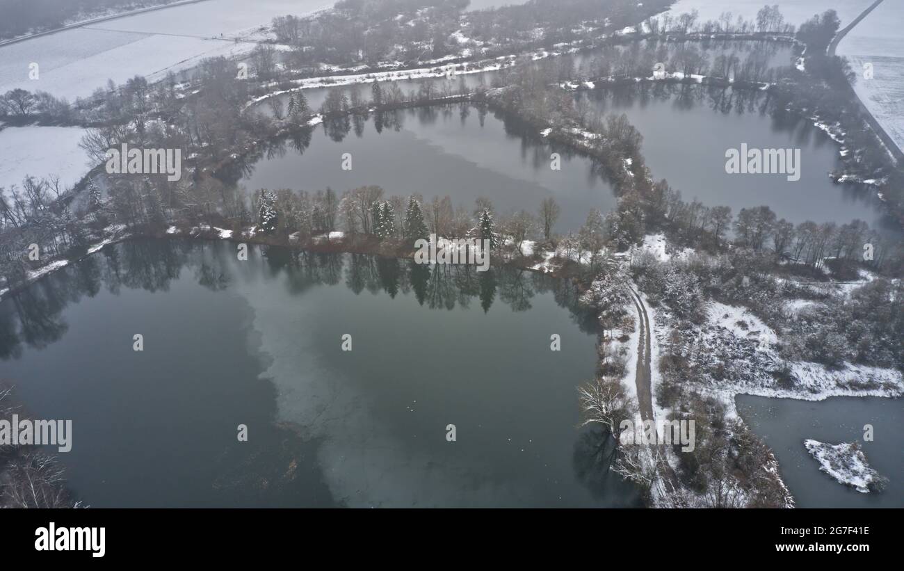 Aerial view of frozen ponds in the woods Stock Photo - Alamy