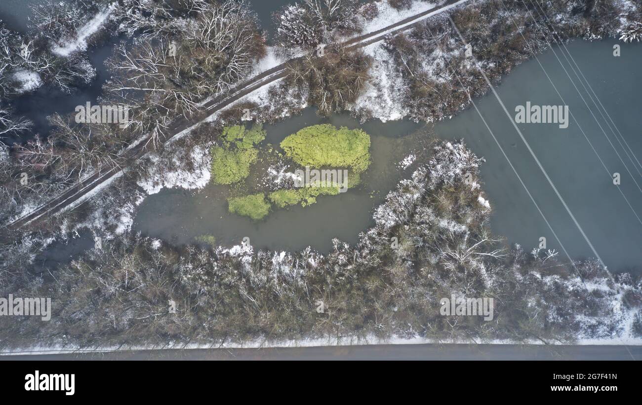Bird's eye view of a frozen pond in the woods Stock Photo - Alamy