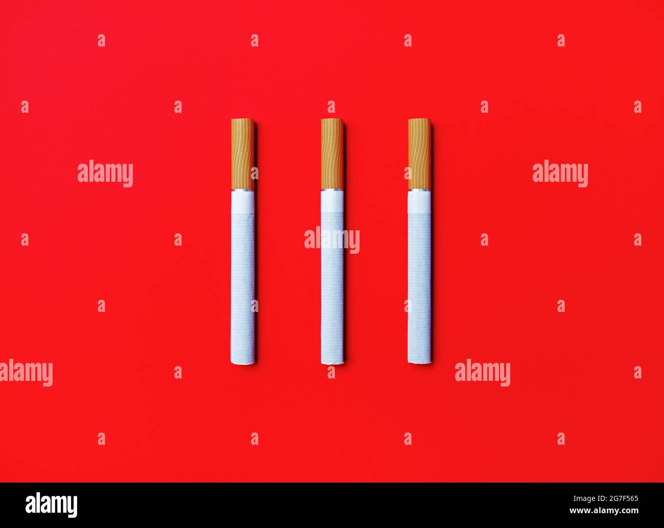 Three people smoking cigarettes hi-res stock photography and images - Alamy