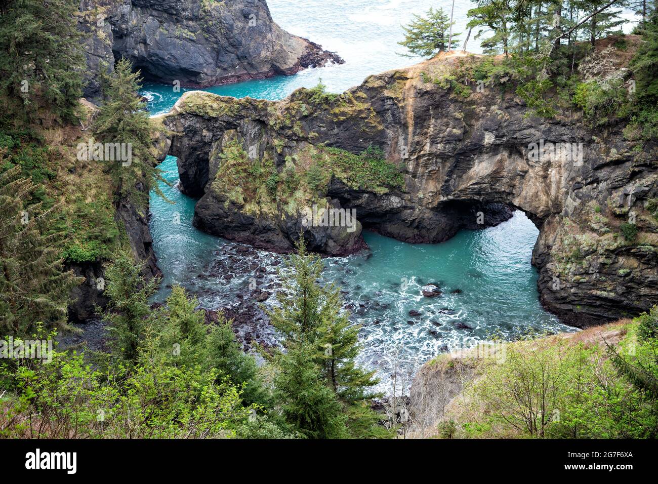 Where rocky coastline jut out into sea. Sea arches and coastal inlets ...