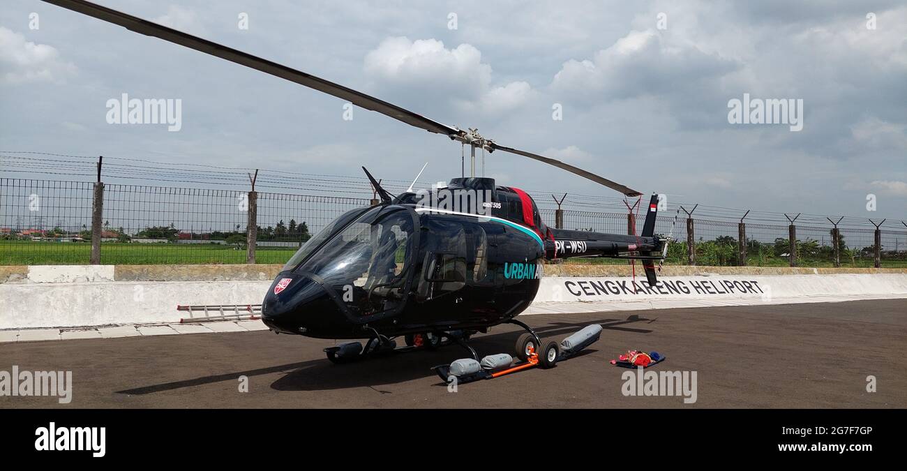 JAKARTA, INDONESIA - Jun 15, 2021: A helicopter launching at Cengkareng ...