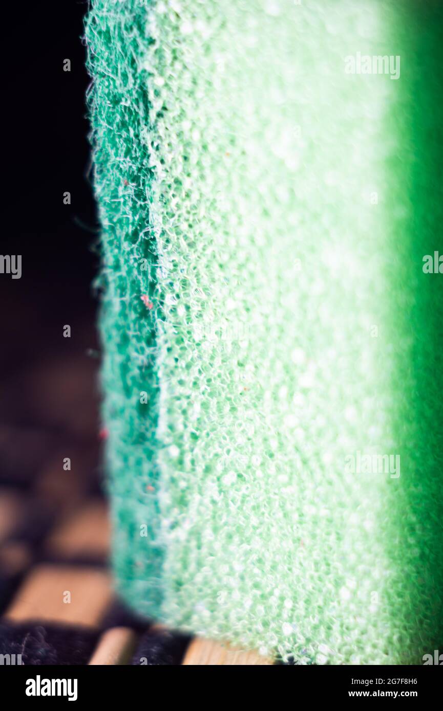 Vertical closeup shot of details on a green sponge Stock Photo - Alamy