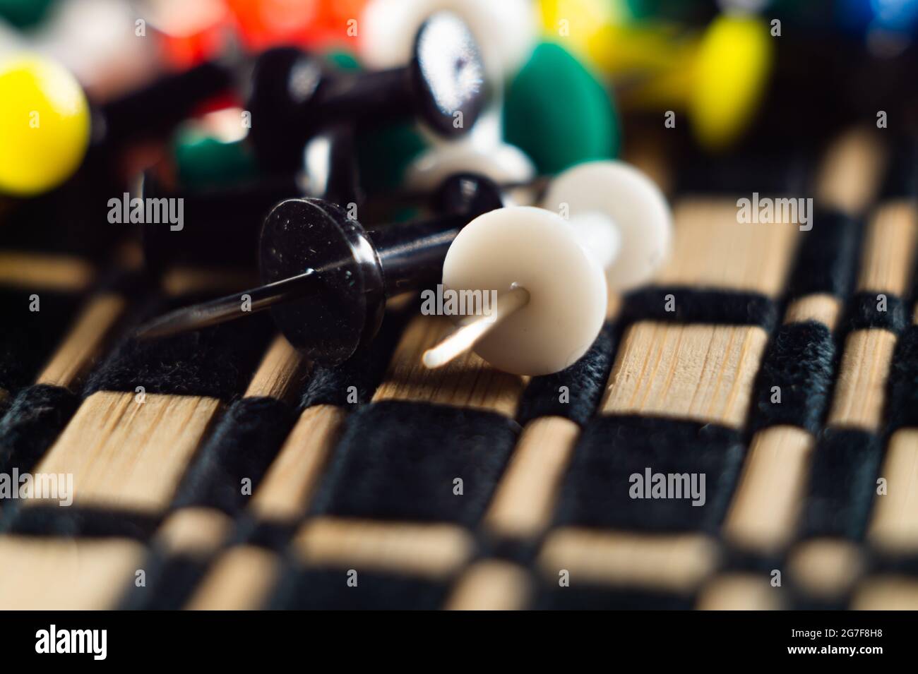 Close up shot of plastic push pins Stock Photo - Alamy