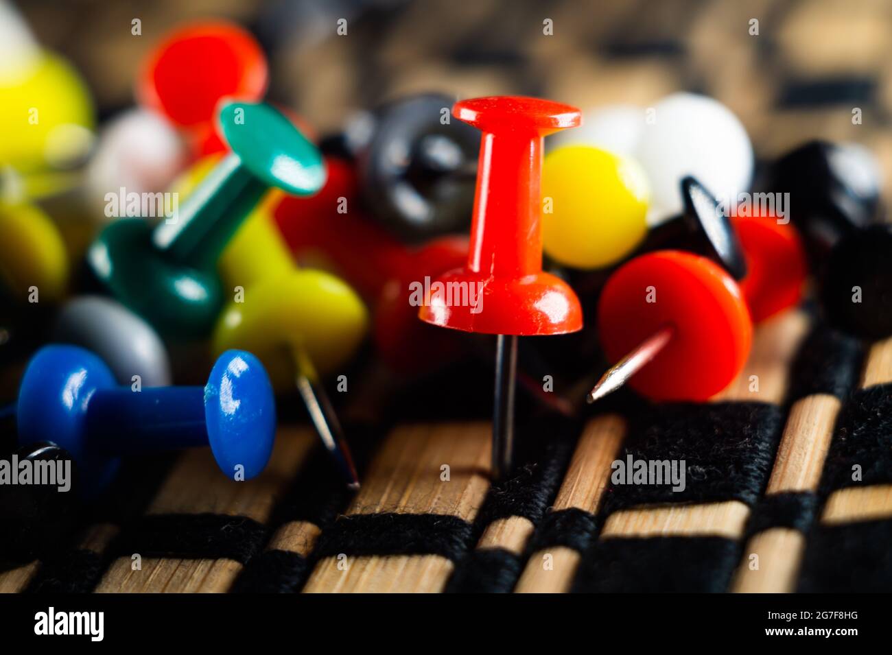 Close up shot of plastic push pins Stock Photo - Alamy