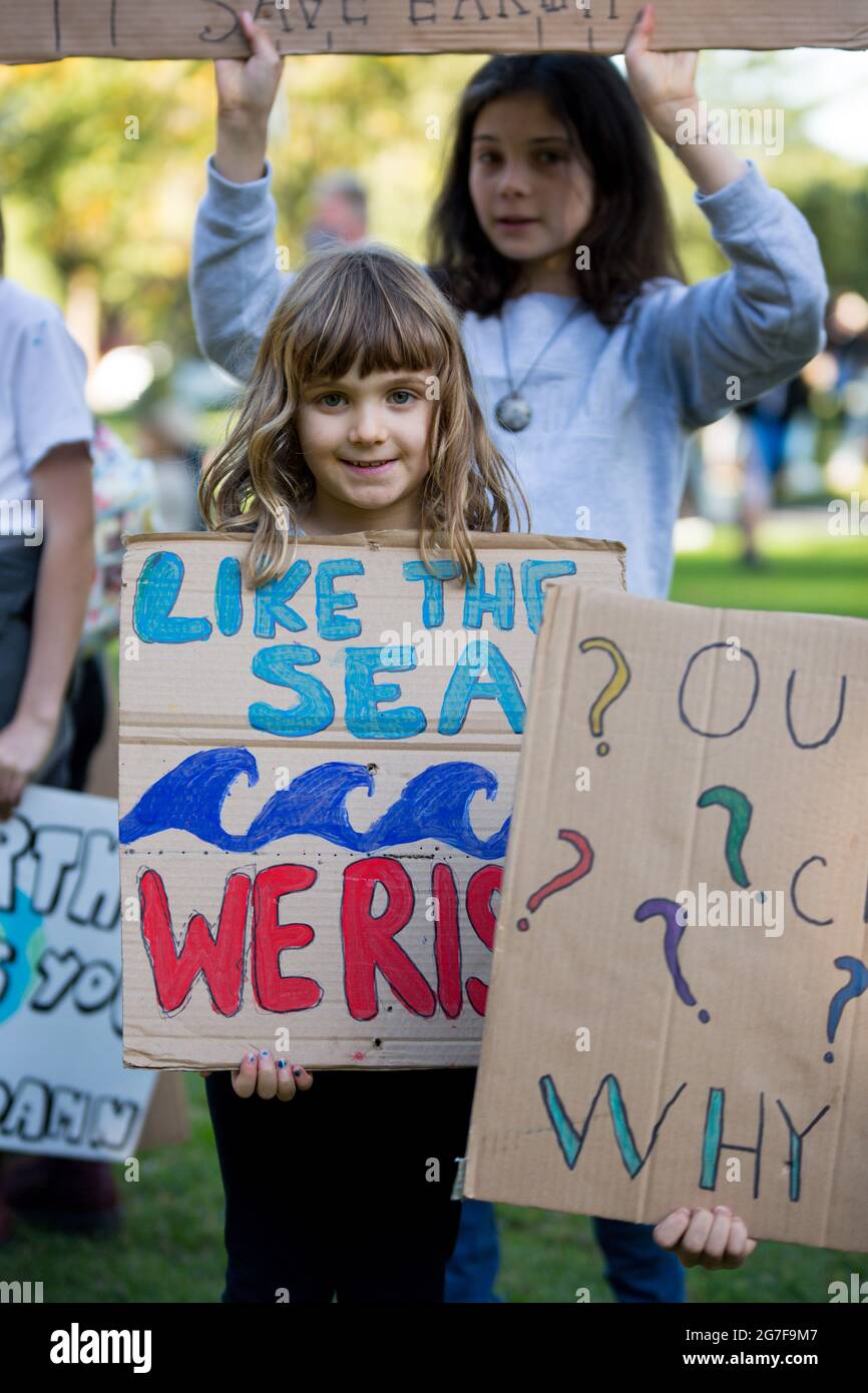 MELBOURNE, AUSTRALIA - May 21, 2021: Passionate kids with their parents ...