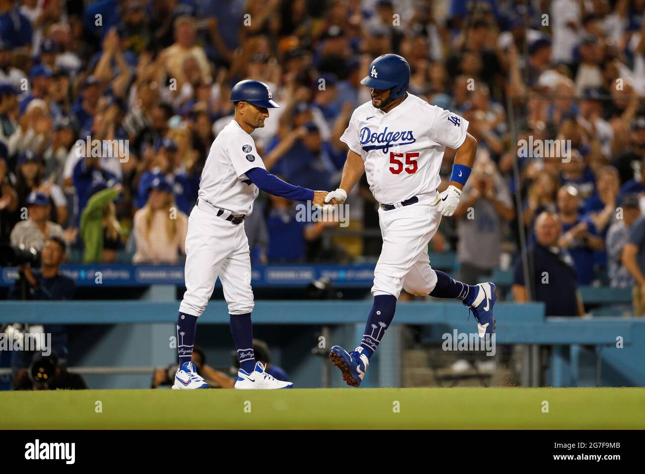 Los Angeles Dodgers first basemen Albert Pujols (55) hits a home run ...