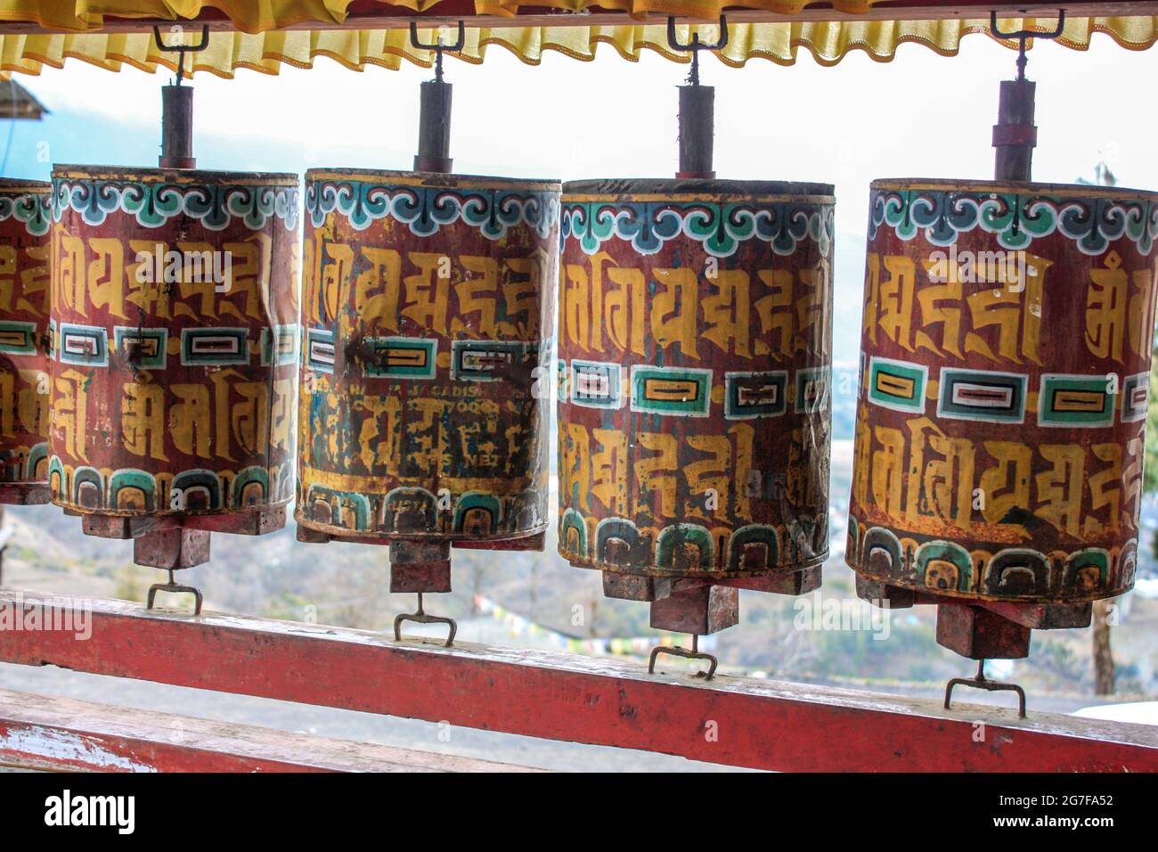 Spinning Buddhist prayer wheels in Tibet Stock Photo - Alamy