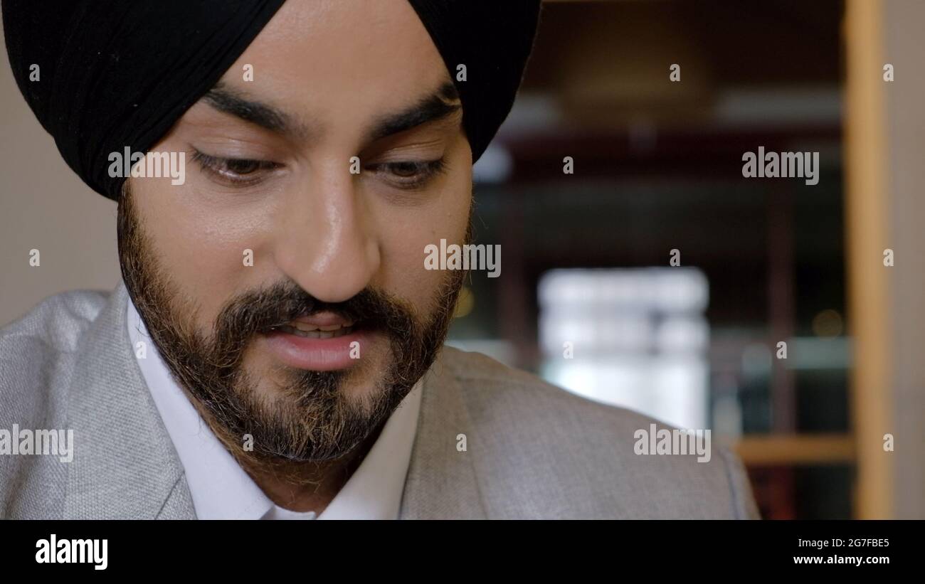Professionally dressed South Asian man from India wearing a black ...