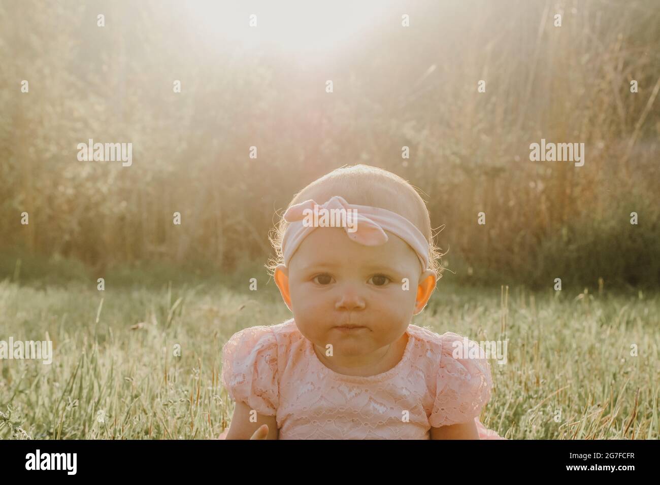 Baby with field hi-res stock photography and images - Alamy