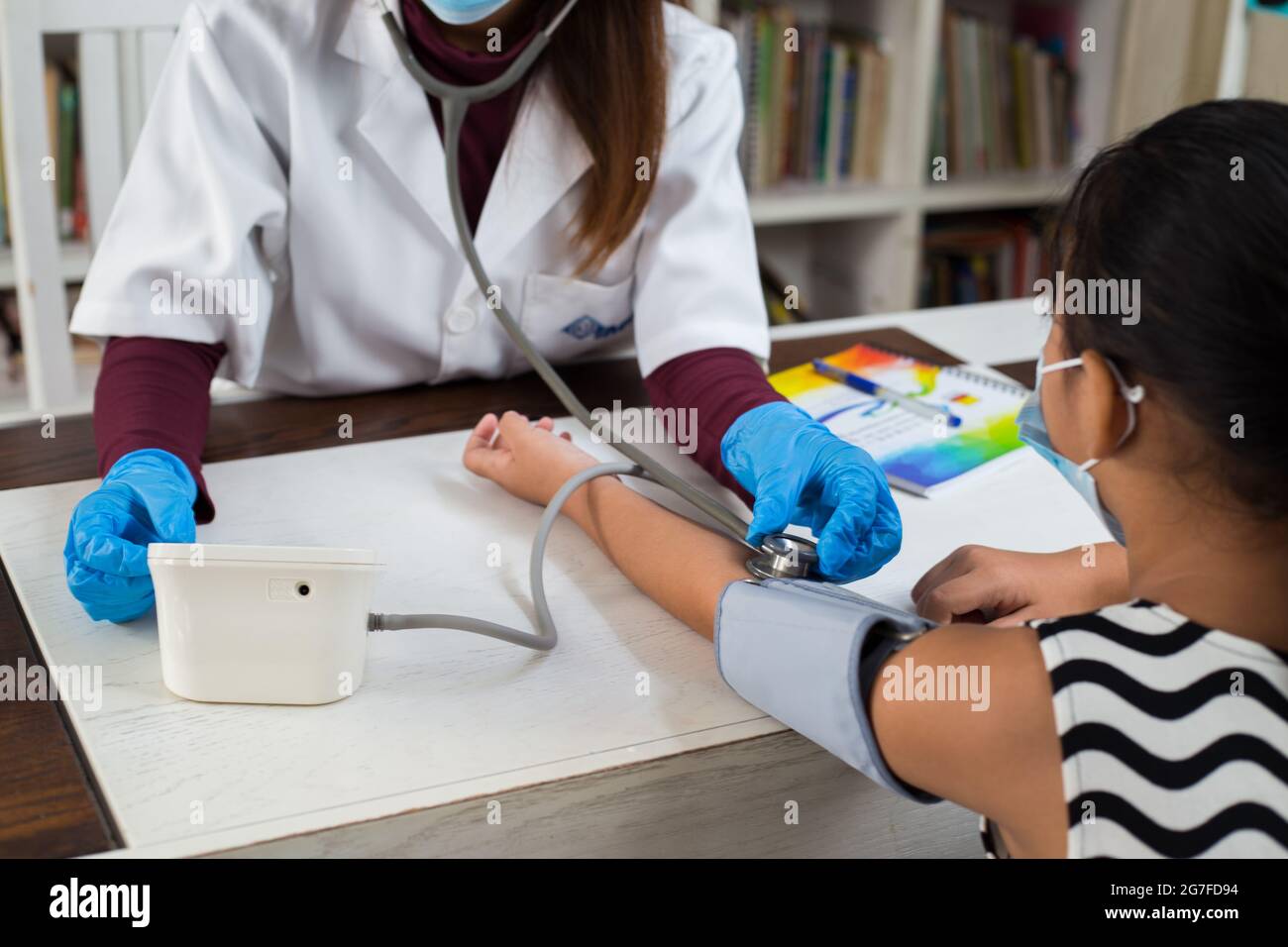 Closeup shot of a doctor checking her patient Stock Photo - Alamy