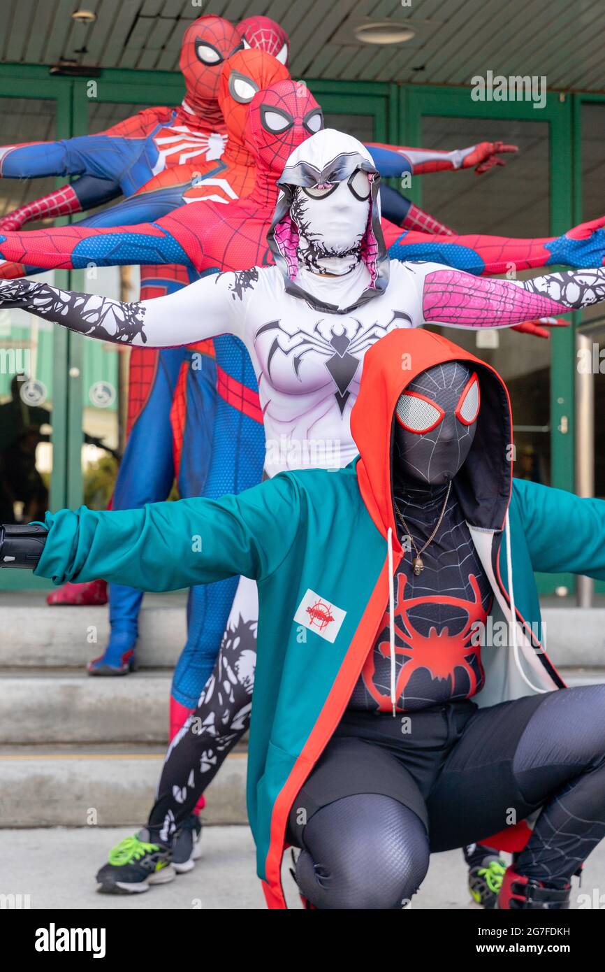 Attendees dressed as Spider-Man and other Marvel characters line up at ...