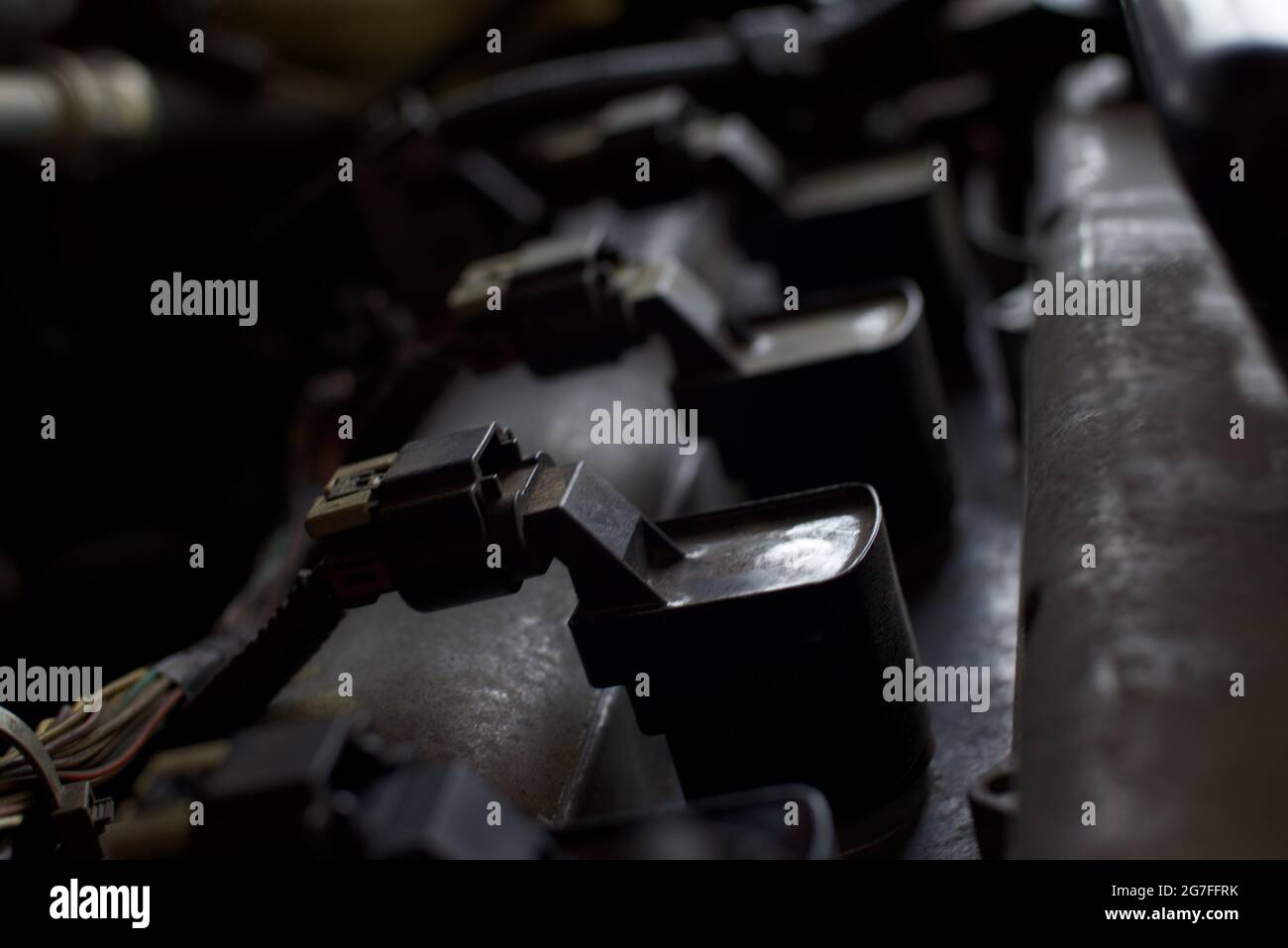 Chevy Cobalt spark plug caps and wires on a car motor close up Stock ...