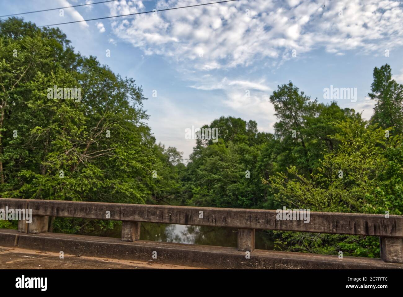 Old concrete bridge rails vintage retro with beautiful river in the ...