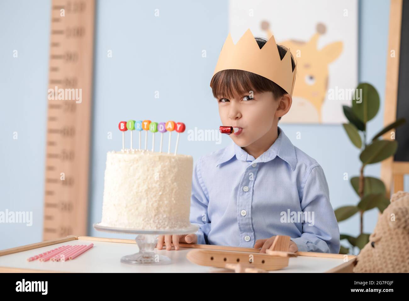 Cute little boy celebrating Birthday at home Stock Photo - Alamy