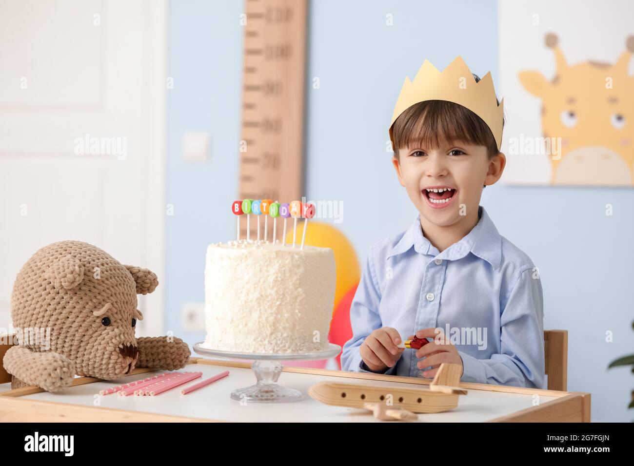 Cute little boy celebrating Birthday at home Stock Photo - Alamy
