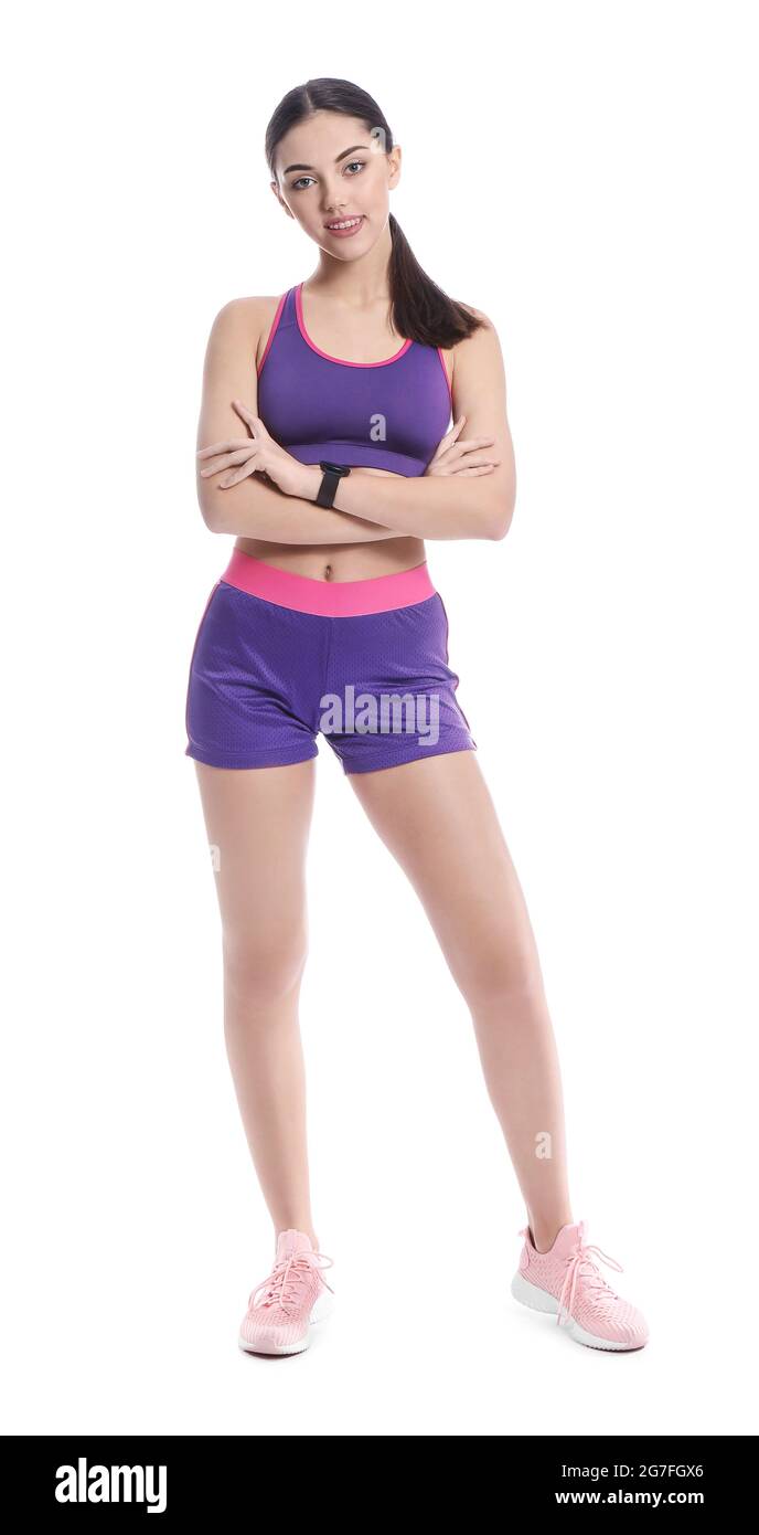 Sporty female coach on white background Stock Photo - Alamy