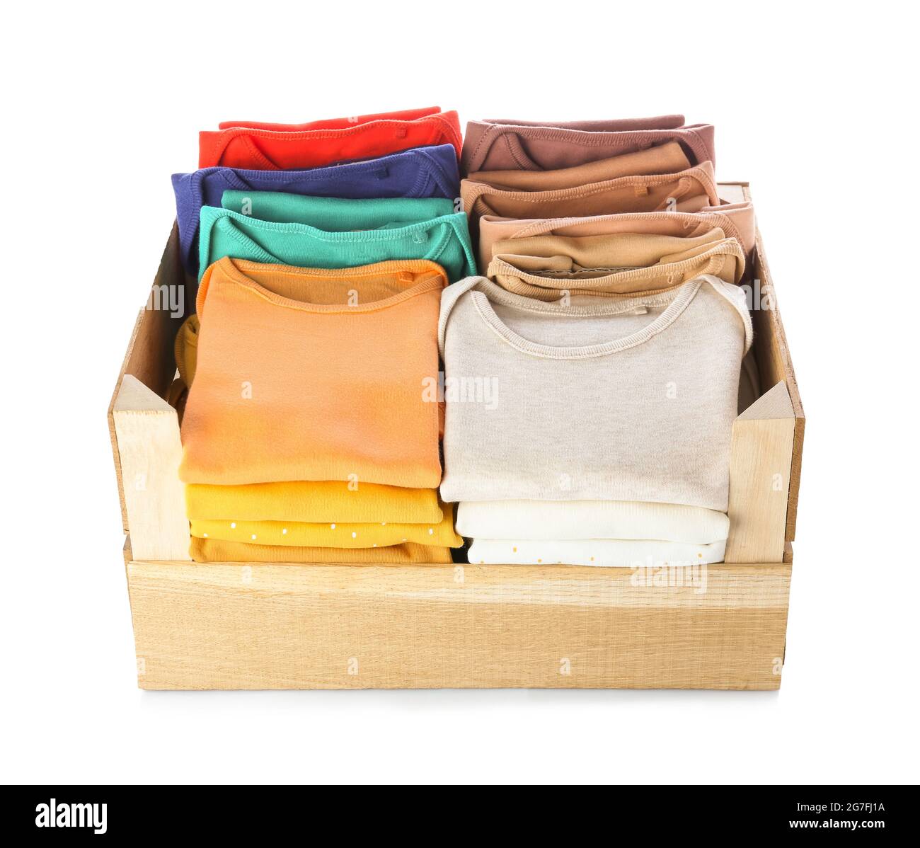 Wooden box with baby clothes on white background Stock Photo - Alamy
