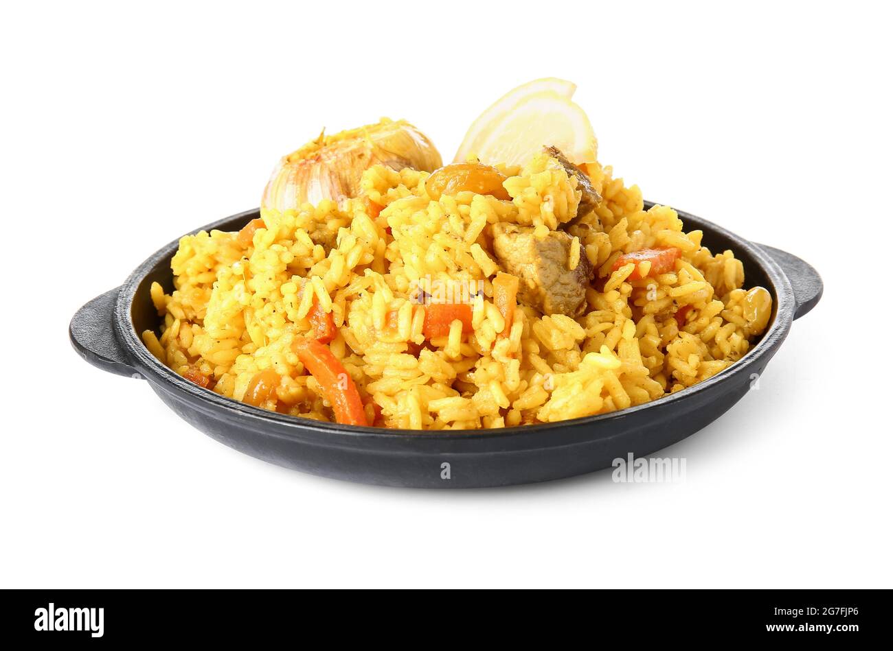 Frying pan with tasty pilaf on white background Stock Photo - Alamy