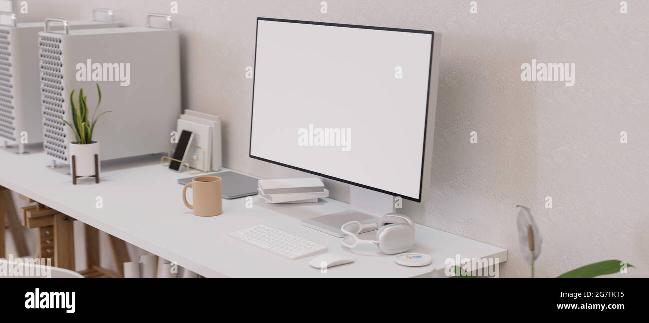 Desktop computer with blank empty screen in modern work space designed ...