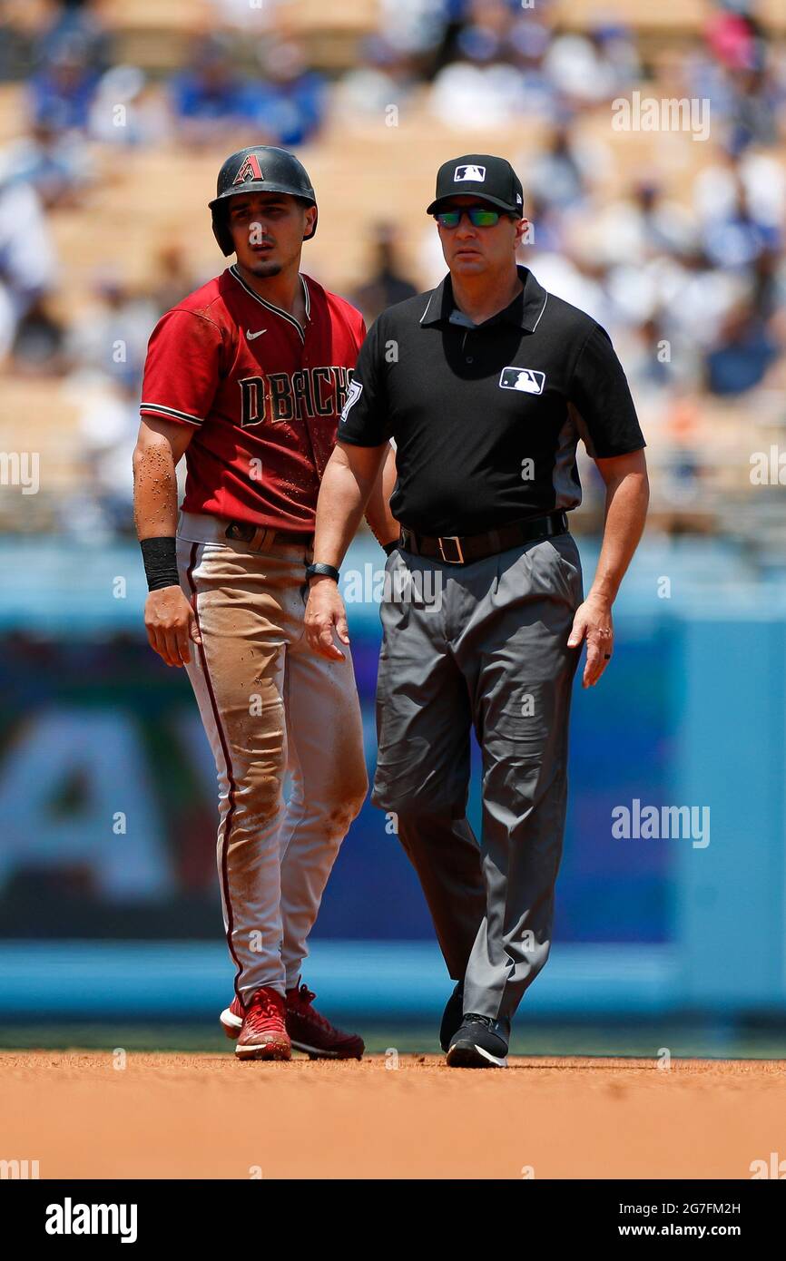 Arizona Diamondbacks infielder Josh Rojas (10) is called out during an ...