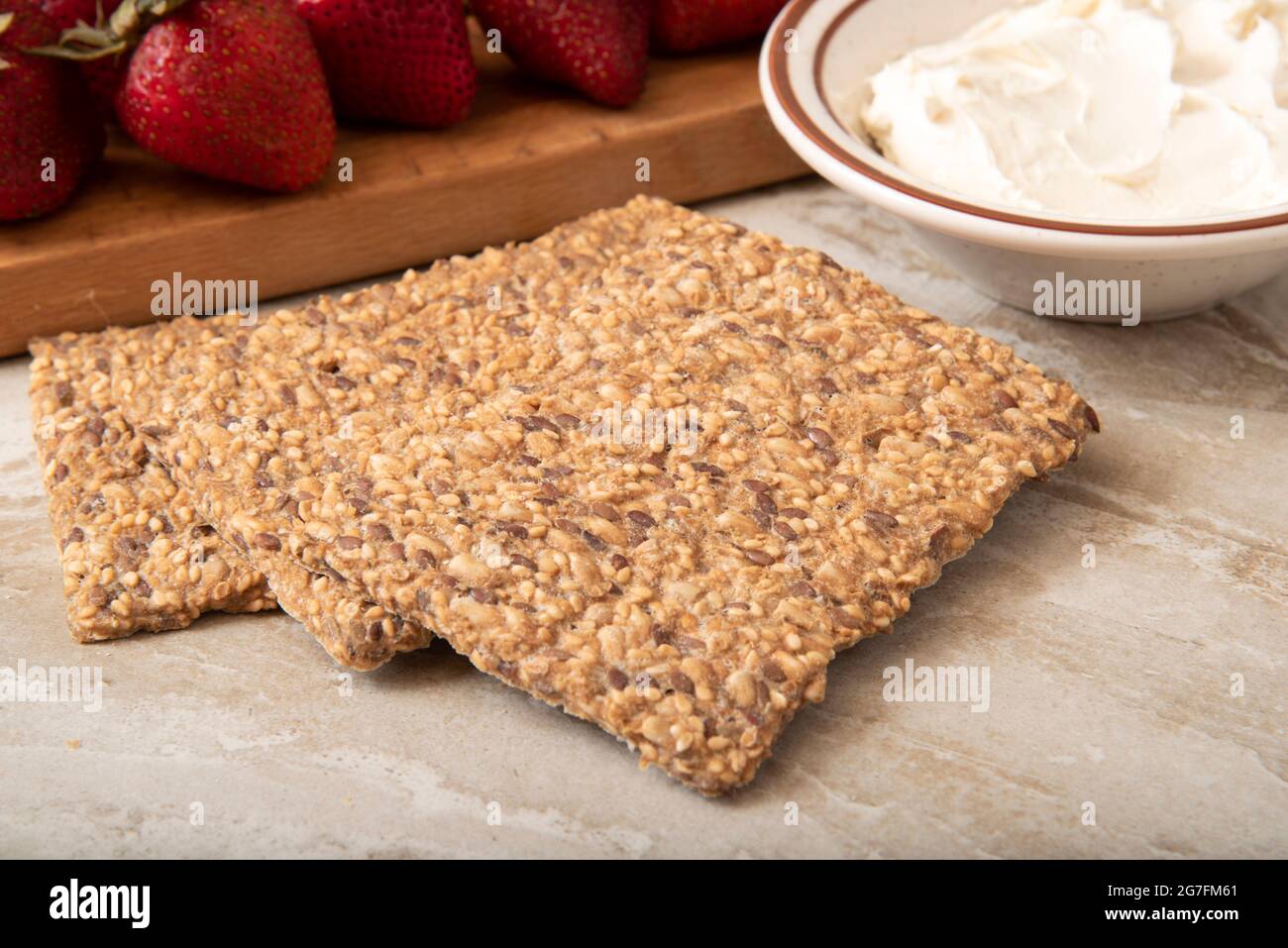 Gluten free crispbread crackers with cream cheese and fresh ...
