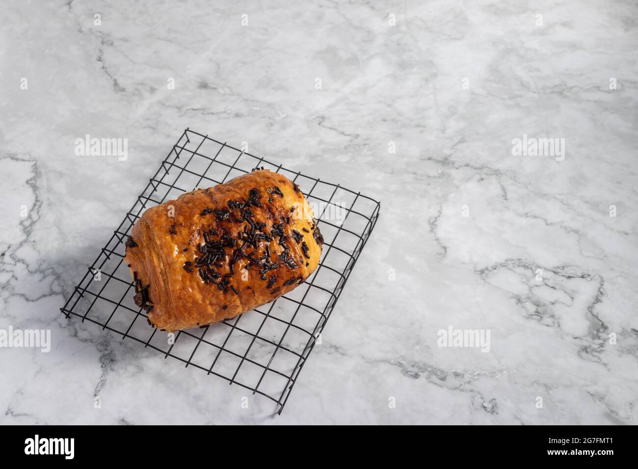 Crunchy and appetizing pastry with sprinkles on a table Stock Photo - Alamy