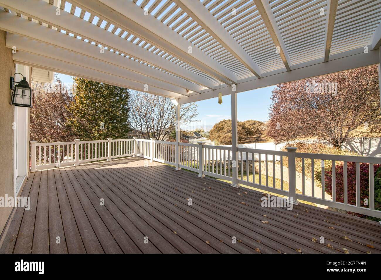 Terrace of a house with pergola roof and wood planks flooring Stock ...