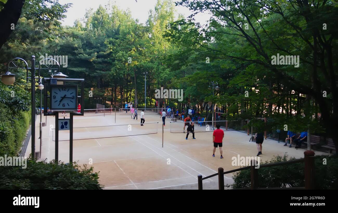 SEOUL, KOREA, SOUTH - Jul 04, 2015: People playing badminton in ...