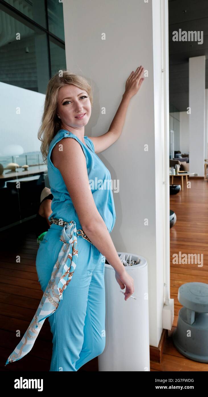 Eastern European Caucasian woman middle aged blonde hair light skin ...