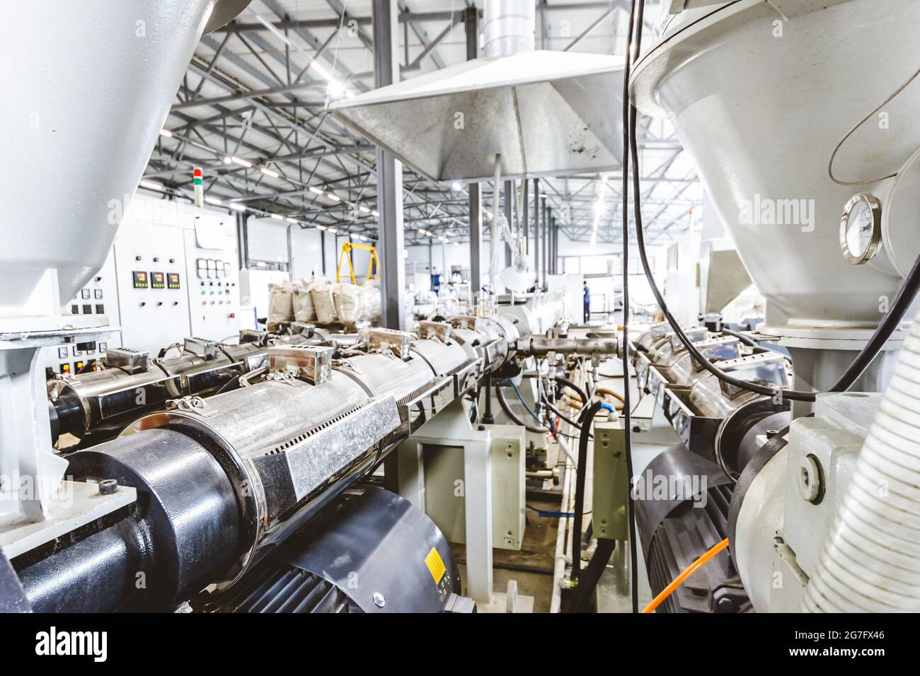 Workshop with extruders for producing plastic pipes. High speed ...
