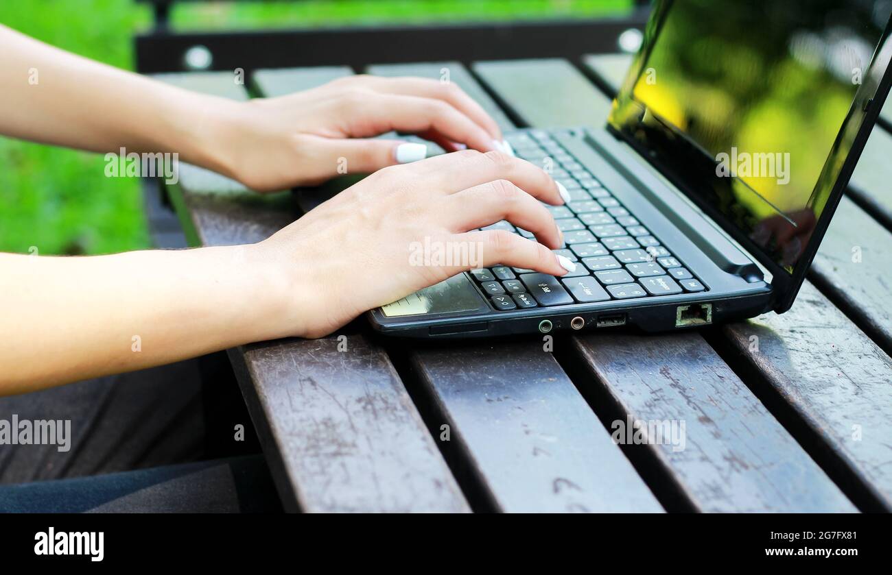 Woman hand using laptop key hi-res stock photography and images - Alamy