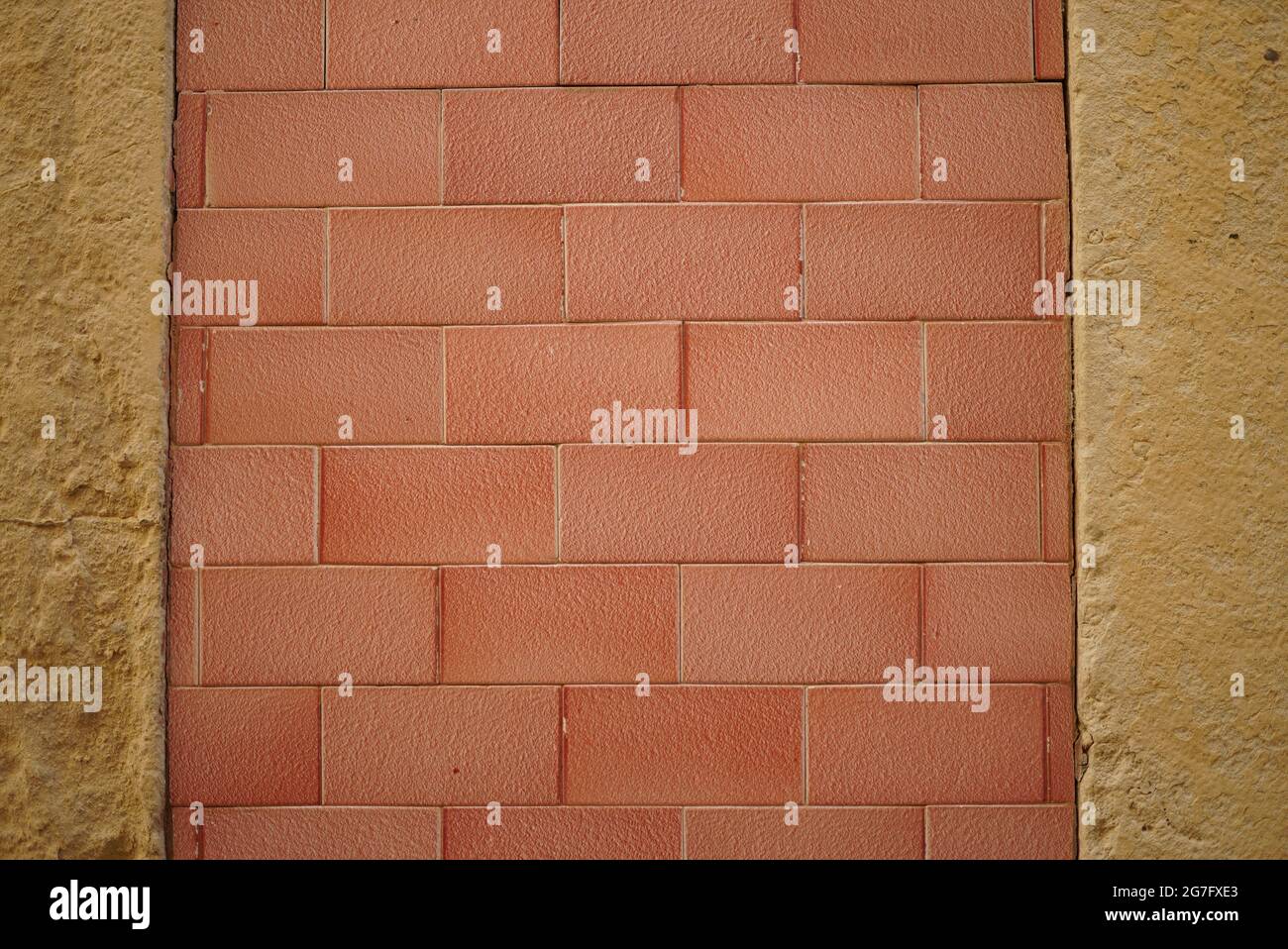 Uneven red brick wall texture Stock Photo - Alamy