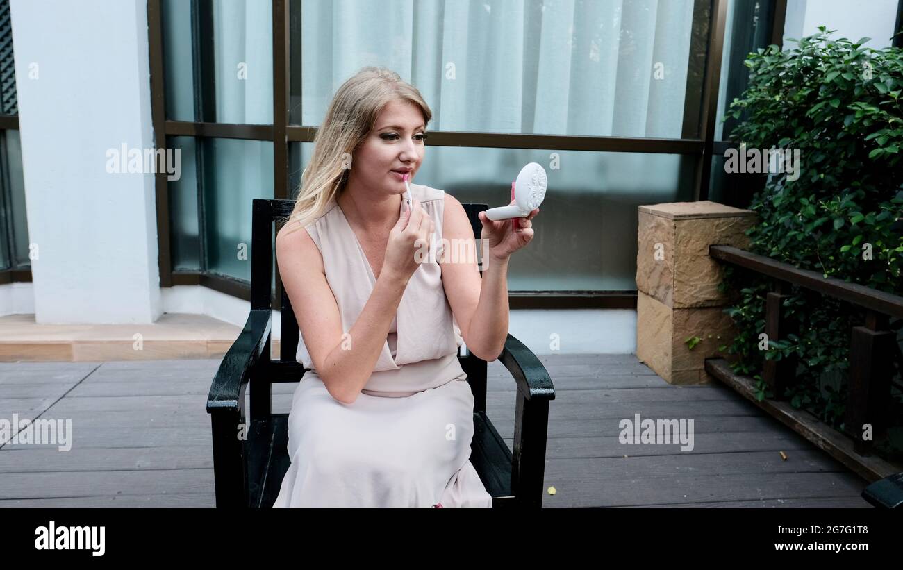 Eastern European Caucasian woman middle aged blonde hair light skin ...