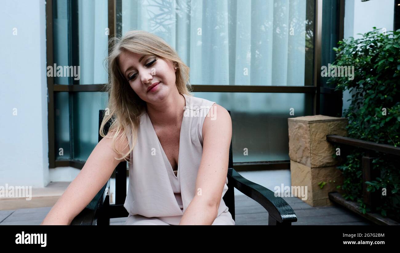 Eastern European Caucasian woman middle aged blonde hair light skin ...