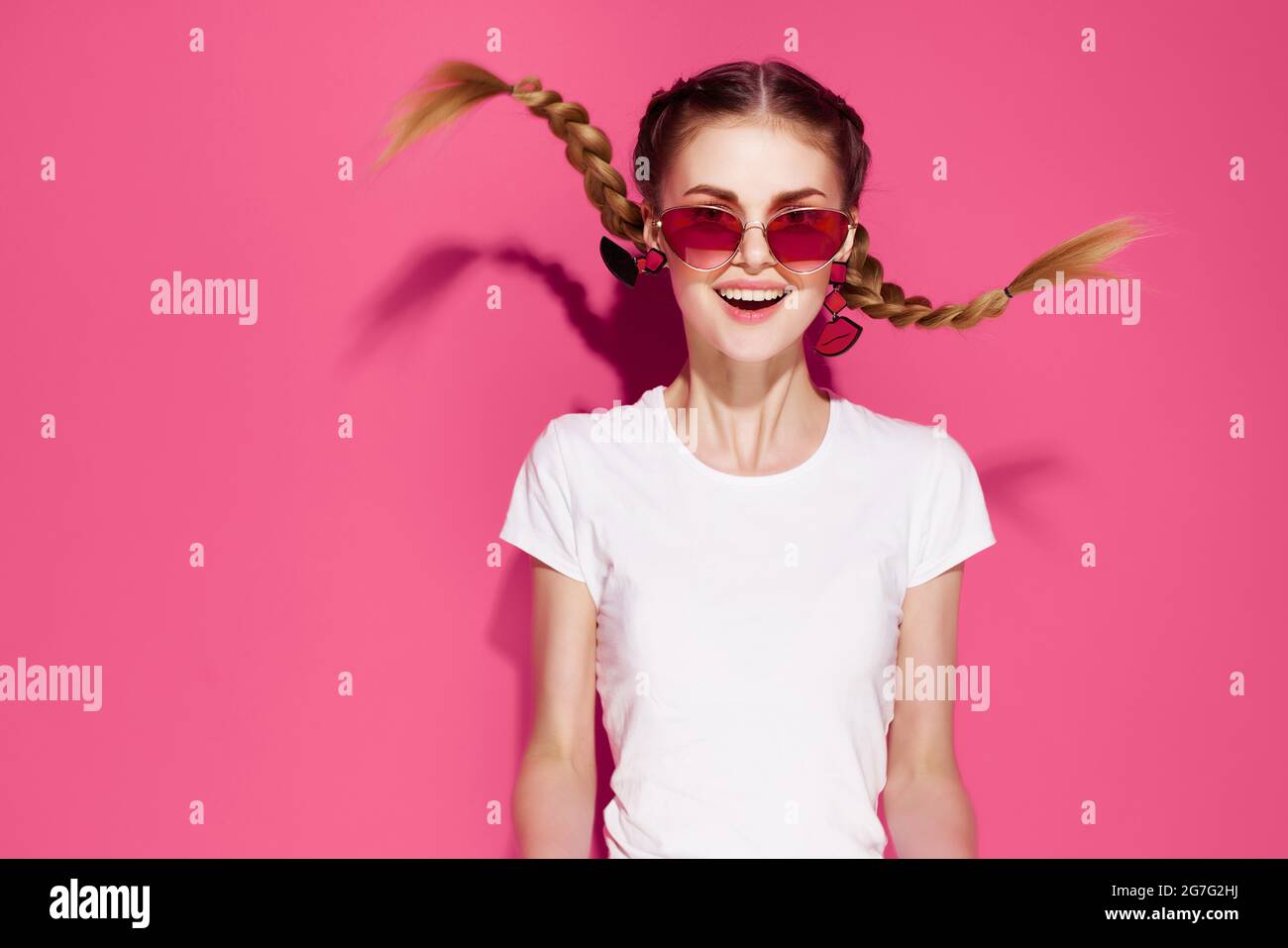 pretty woman wearing sunglasses glamor braids lifestyle fashion pink ...