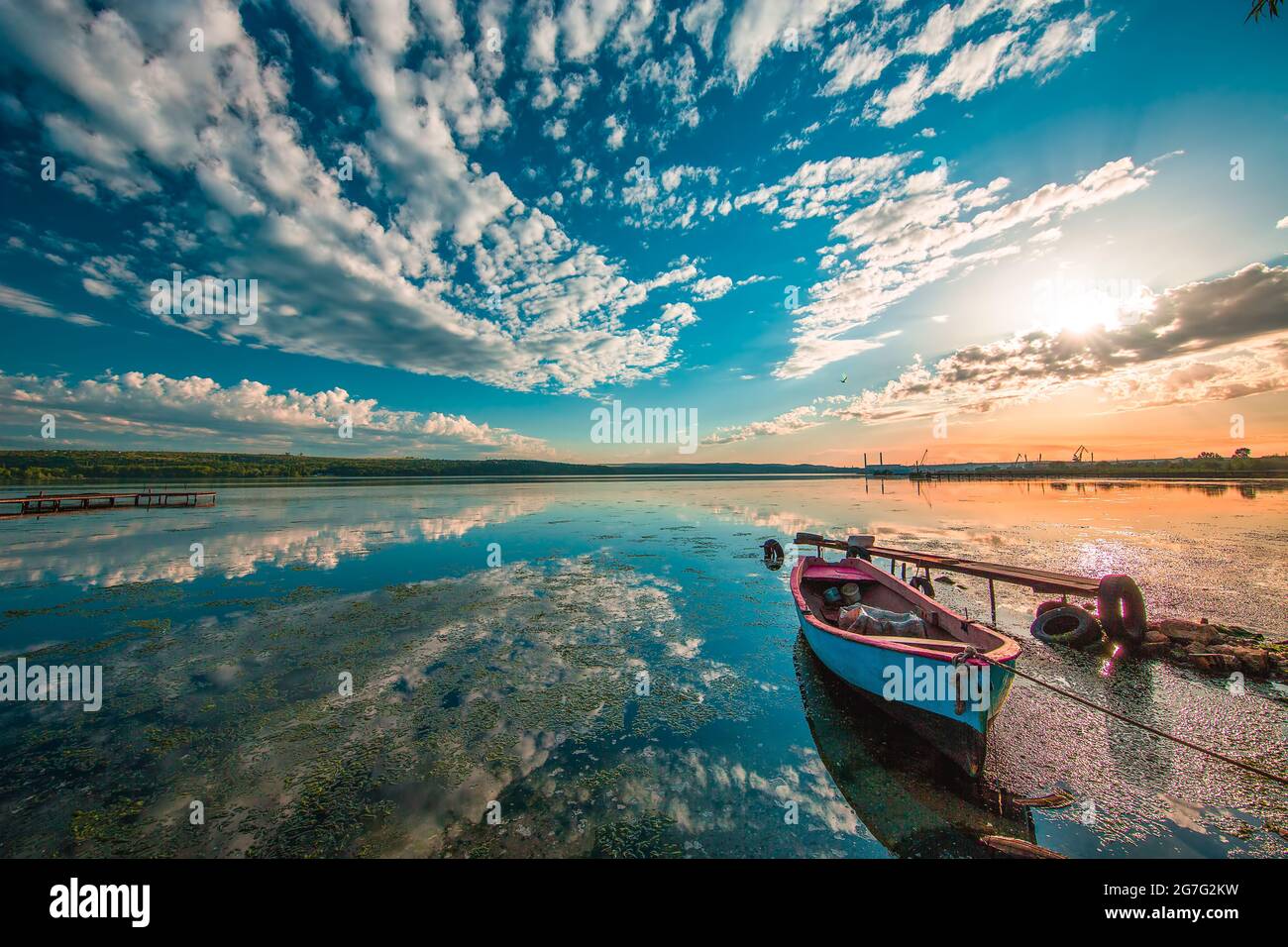 Sunrise fishing dock boat morning hi-res stock photography and images ...