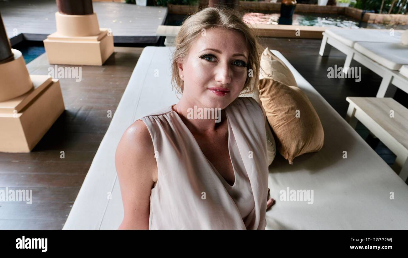 Eastern European Caucasian woman middle aged blonde hair light skin ...