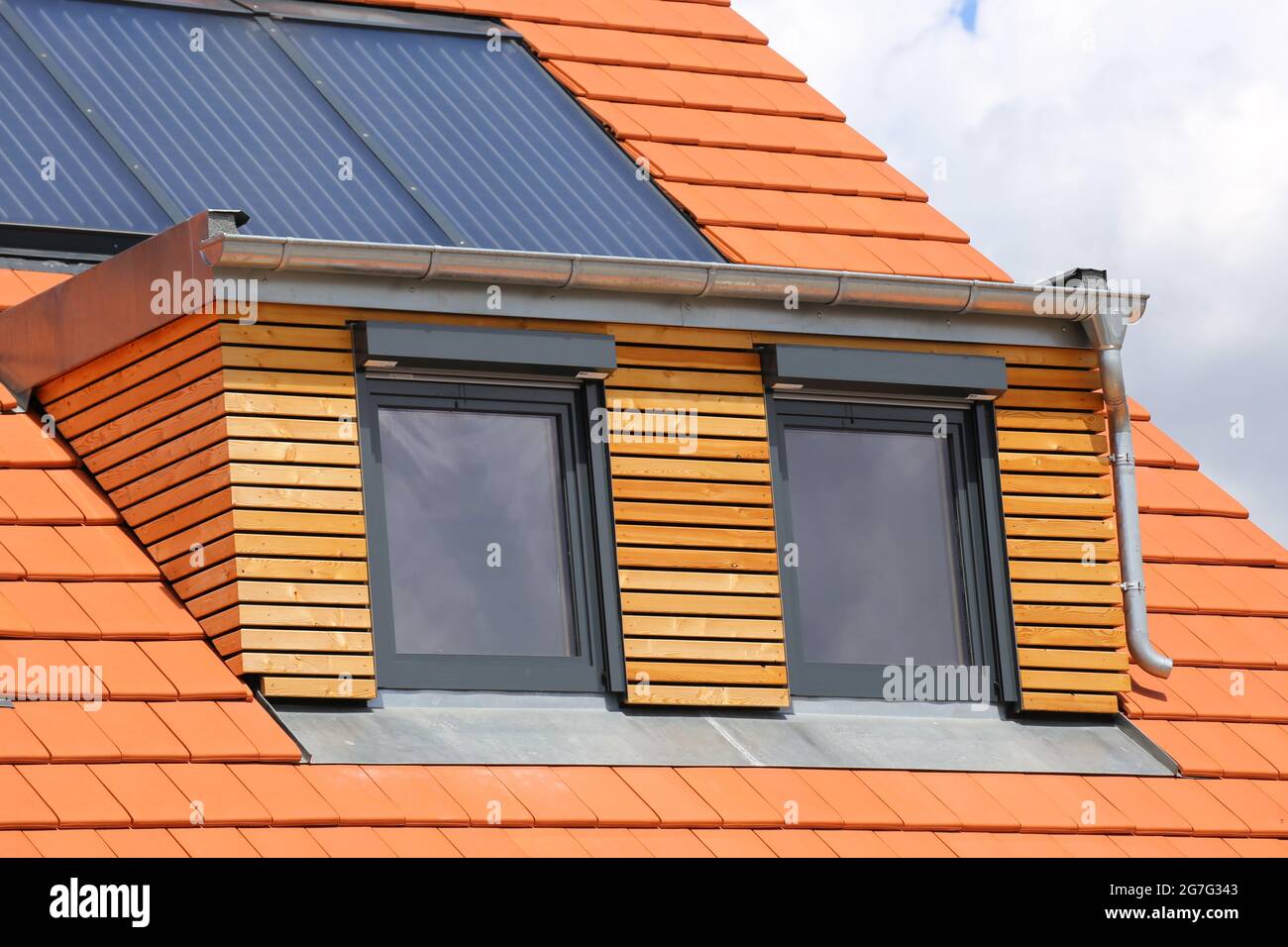 New dormer with wooden cladding Stock Photo - Alamy