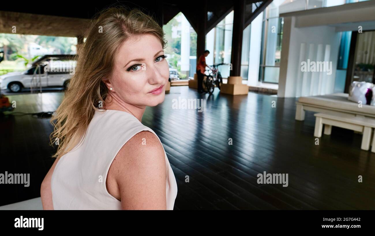 Eastern European Caucasian woman middle aged blonde hair light skin ...