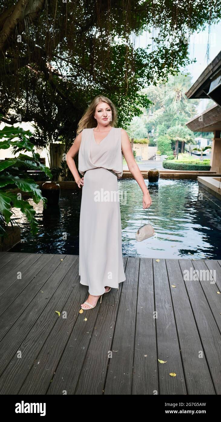 Eastern European Caucasian woman middle aged blonde hair light skin ...