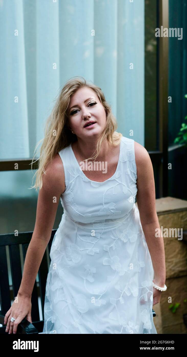 White and cream dress hi-res stock photography and images - Alamy